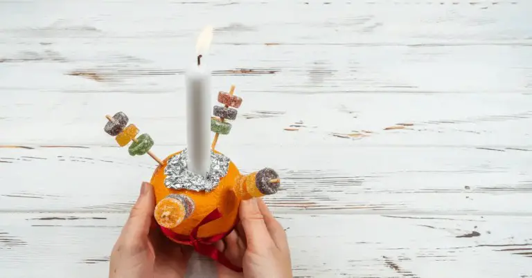 What Is A Christingle Service + The Meaning Behind - Open for Christmas